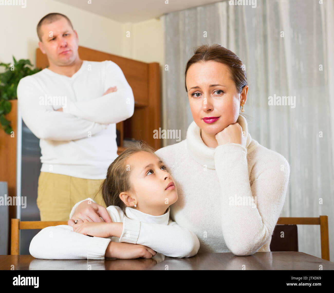 Father comforting crying daughter hi-res stock photography and images ...