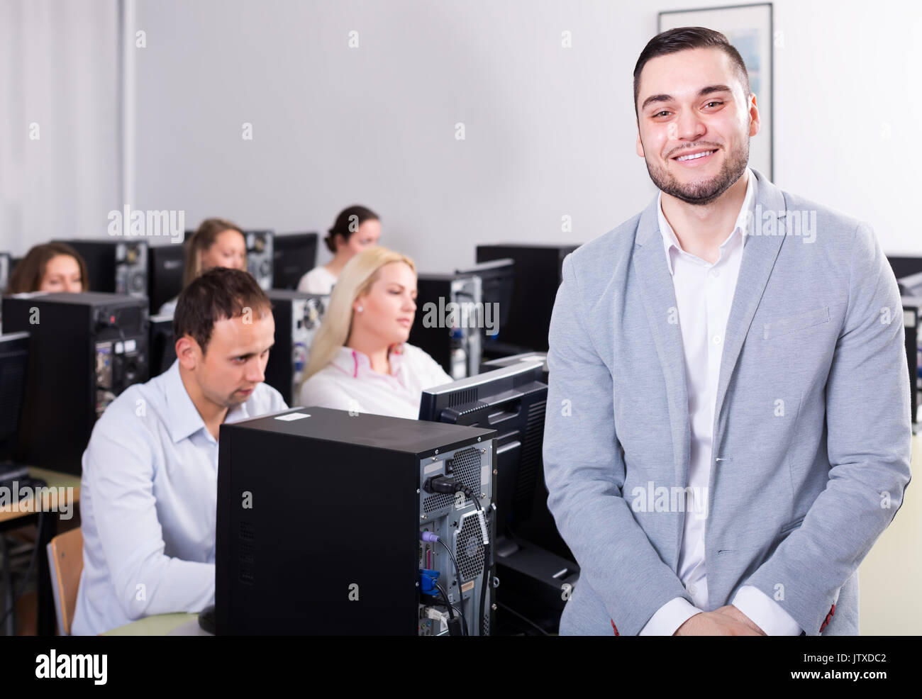 portrait of successful supervisor giving instructions to team Stock ...