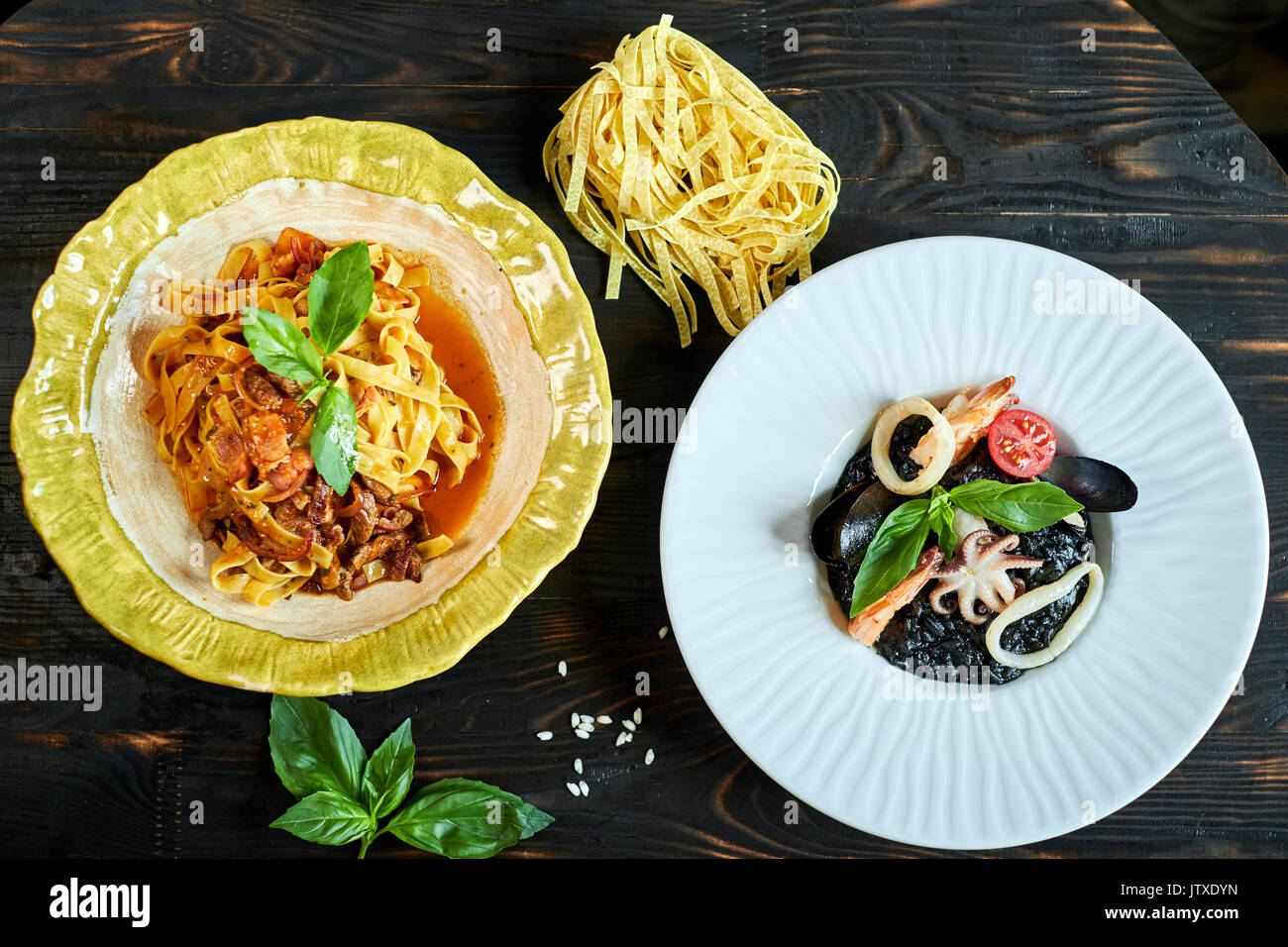 Italian penne pasta with tomatoes and pesto in a restaurant jpg Stock ...