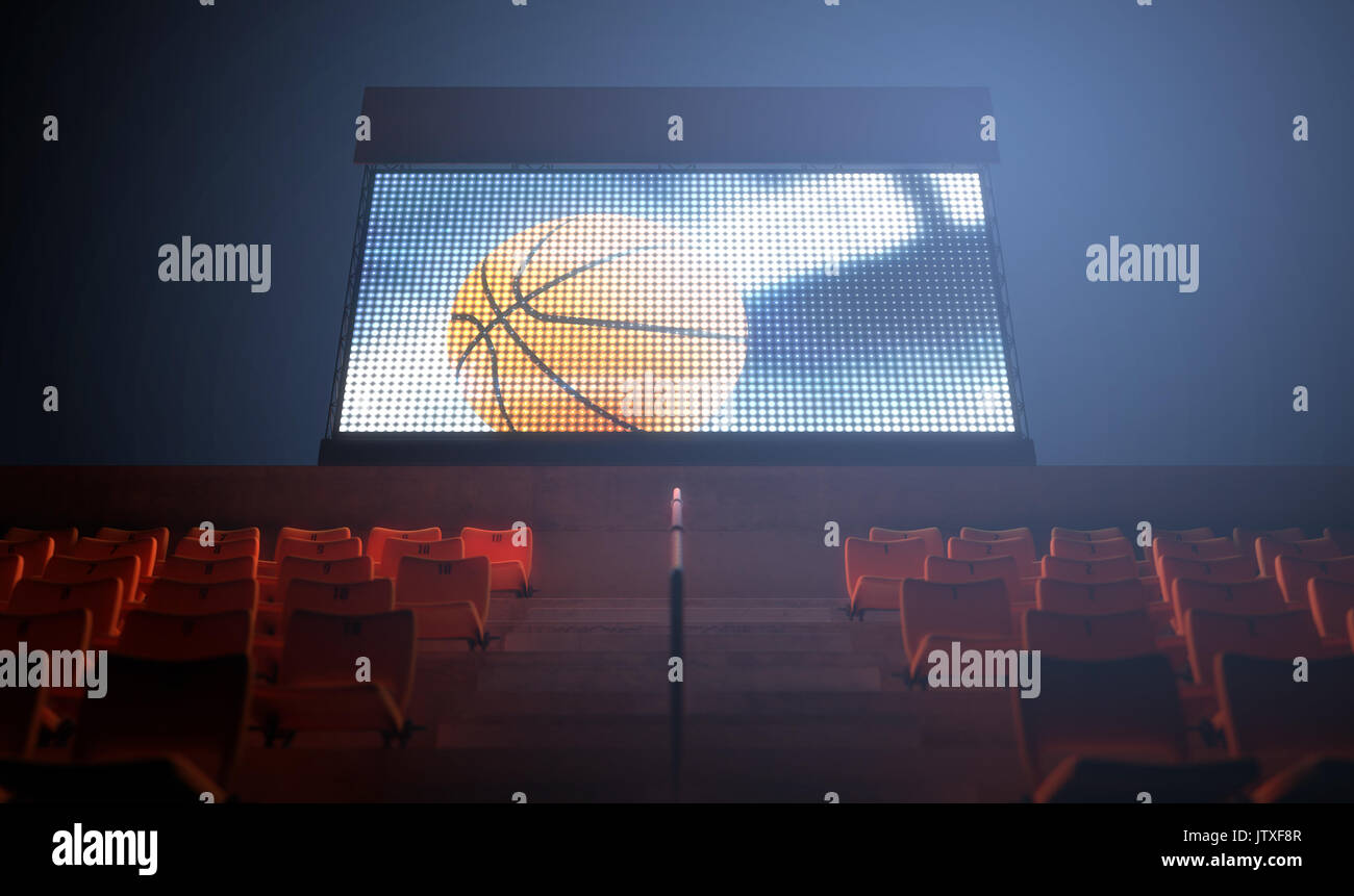 An illuminated stadium big screen showing a basketball replay in the ...