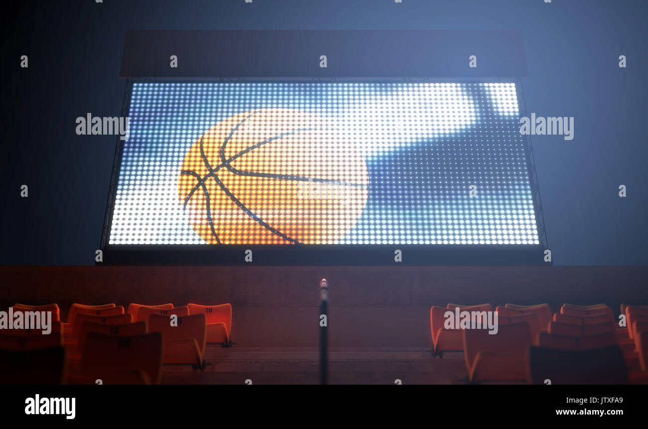 An illuminated stadium big screen showing a basketball replay in the ...