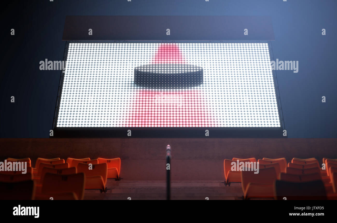 An illuminated stadium big screen showing a hockey replay in the stands ...