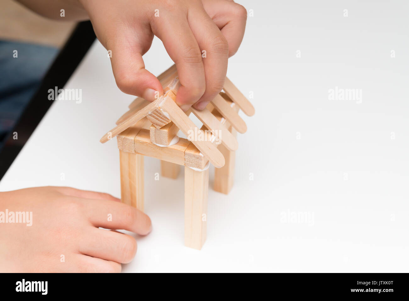 kid making a house model at home Stock Photo - Alamy