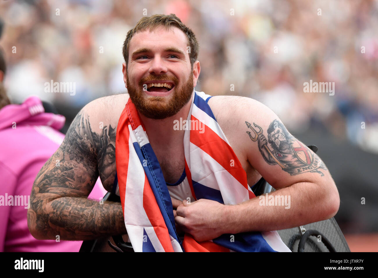 Mickey Bushell competing in the T53 100m final wheelchair race in the ...