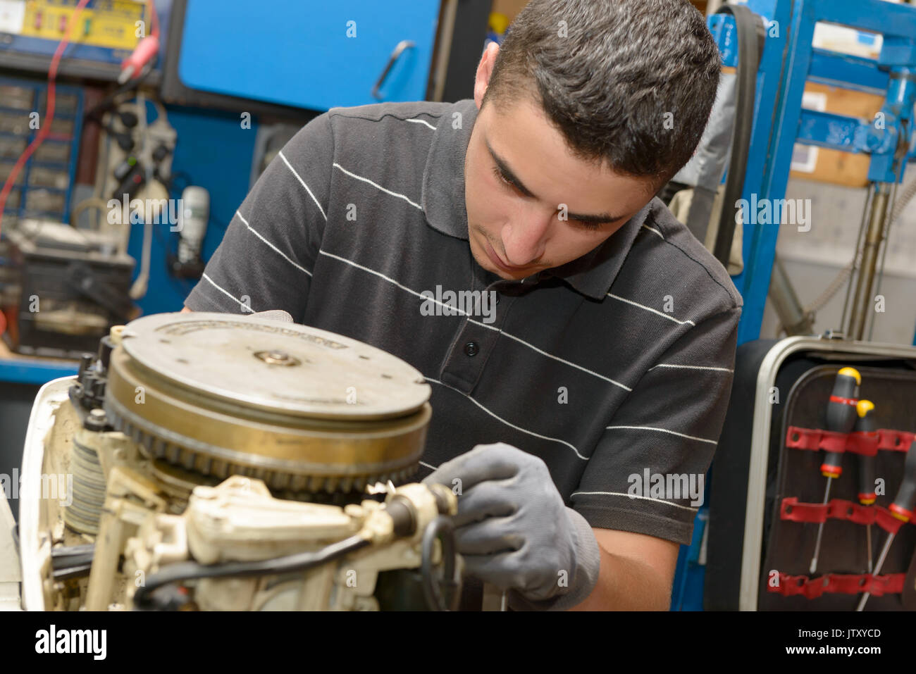 Man repairing motor boat hi-res stock photography and images - Alamy