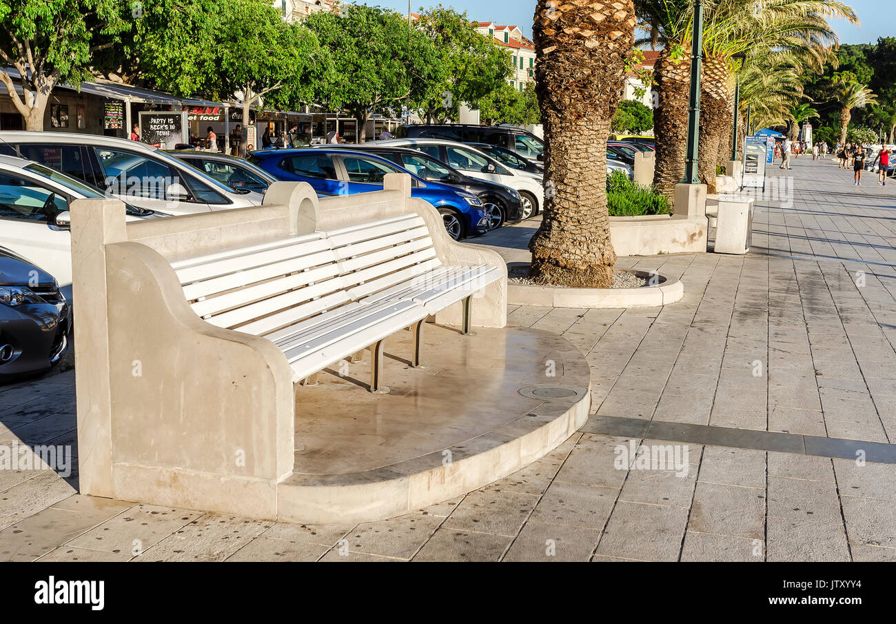 Bench on the sea promenade Stock Photo - Alamy