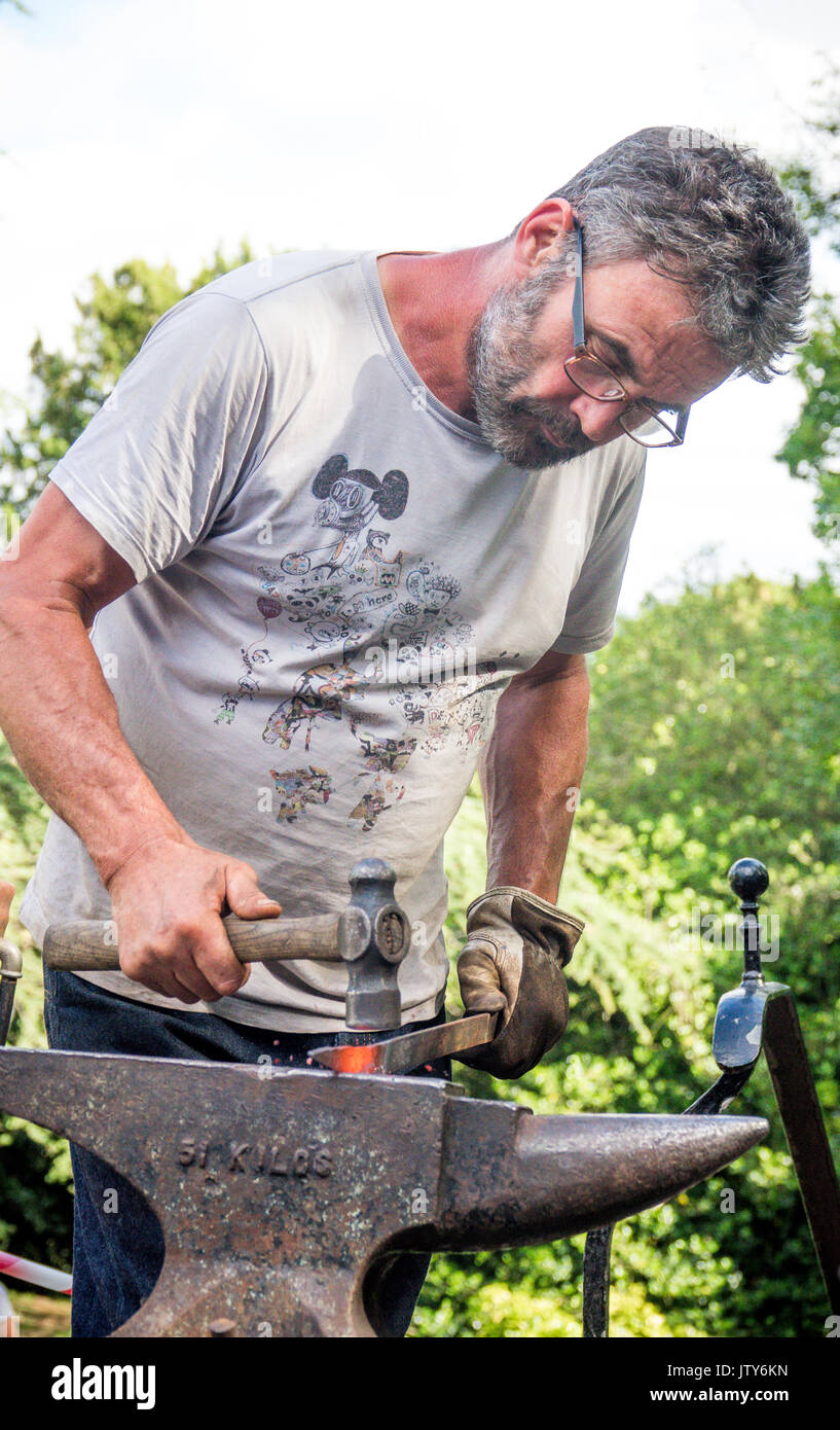 Man medieval festival blacksmith hi-res stock photography and images ...
