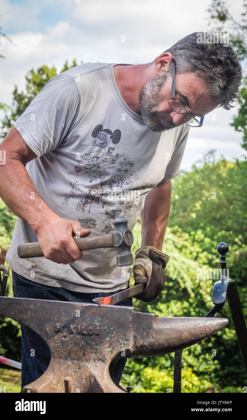 Man medieval festival blacksmith hi-res stock photography and images ...