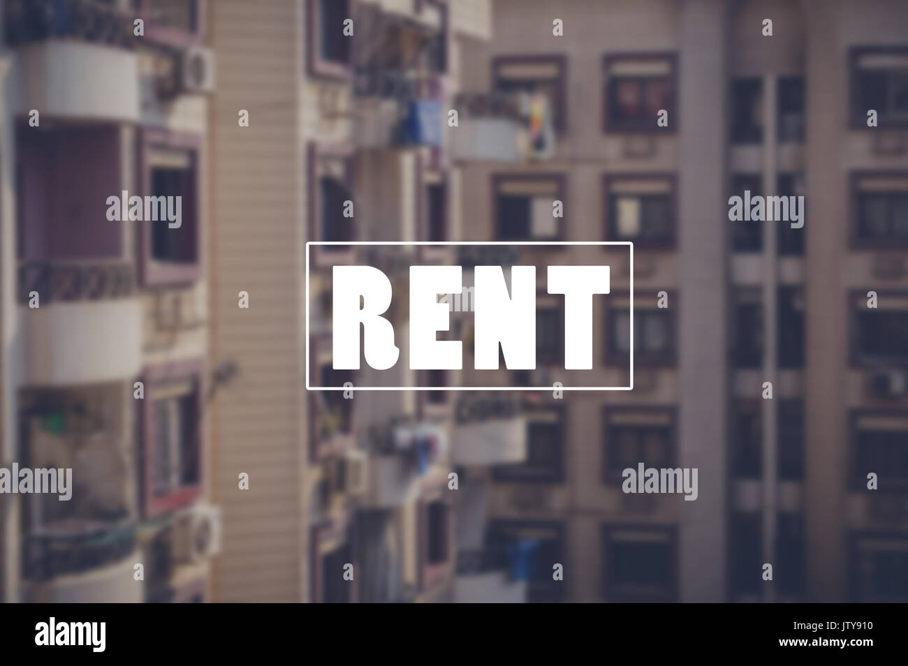 Rent with blurring buildings background Stock Photo - Alamy