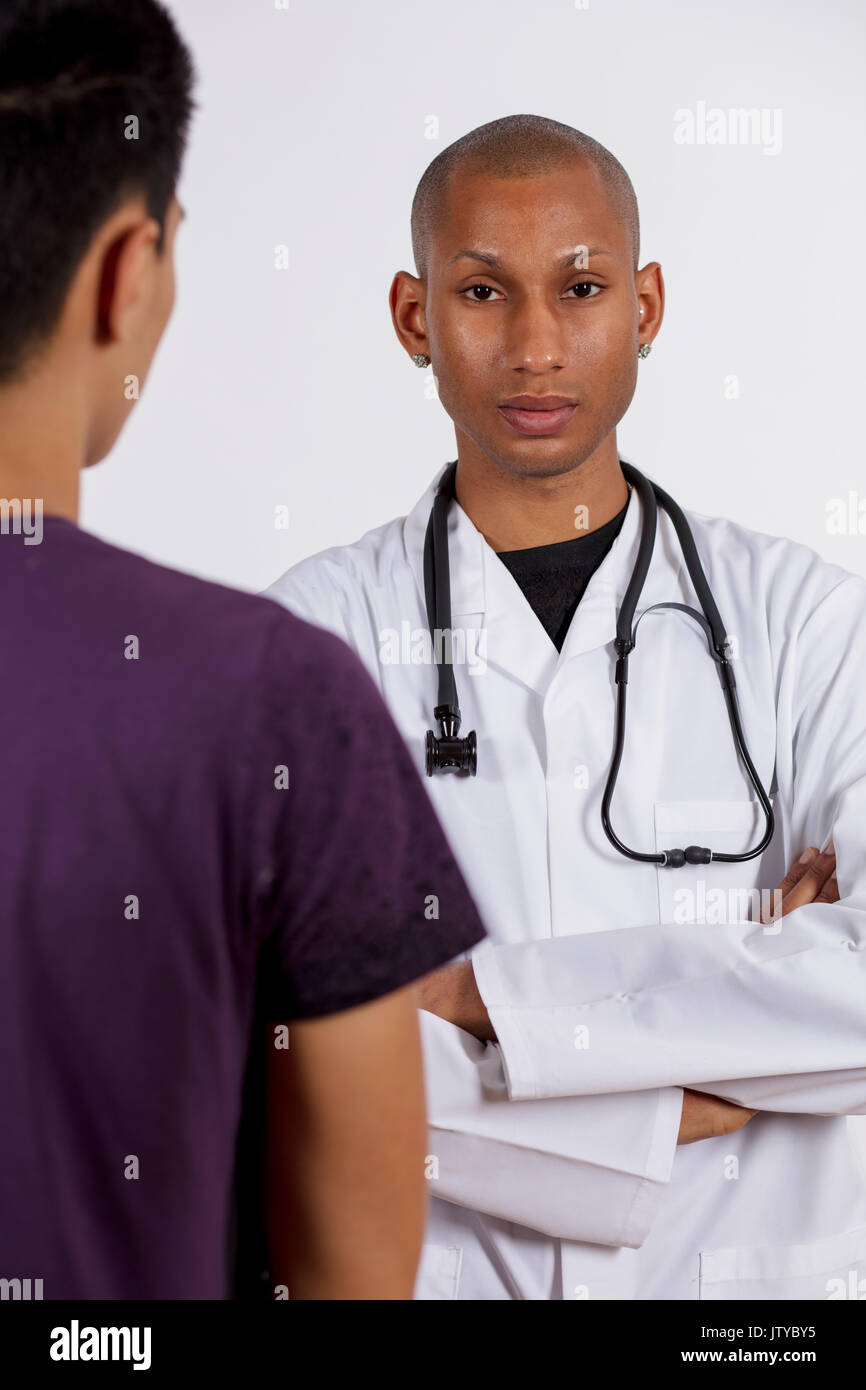 Auscultating patient with stethoscope hi-res stock photography and ...