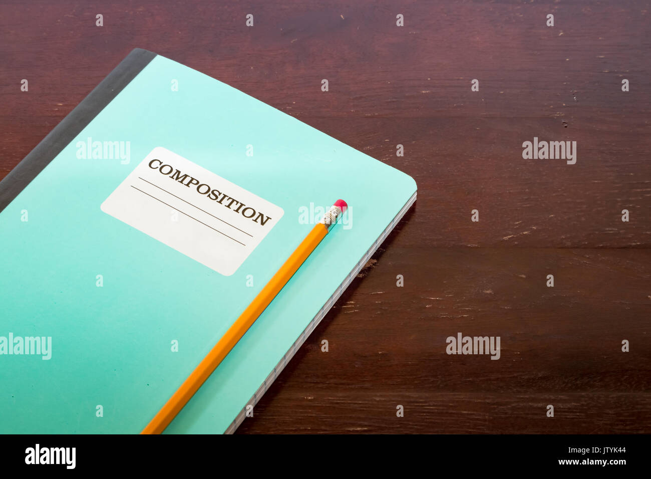 Composition notepad and pencil on a table with lines for writing Stock ...