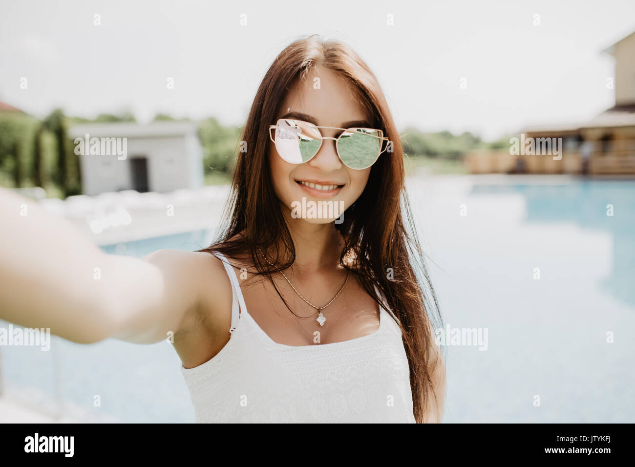 Beautiful women taking selfie swimming hi-res stock photography and ...