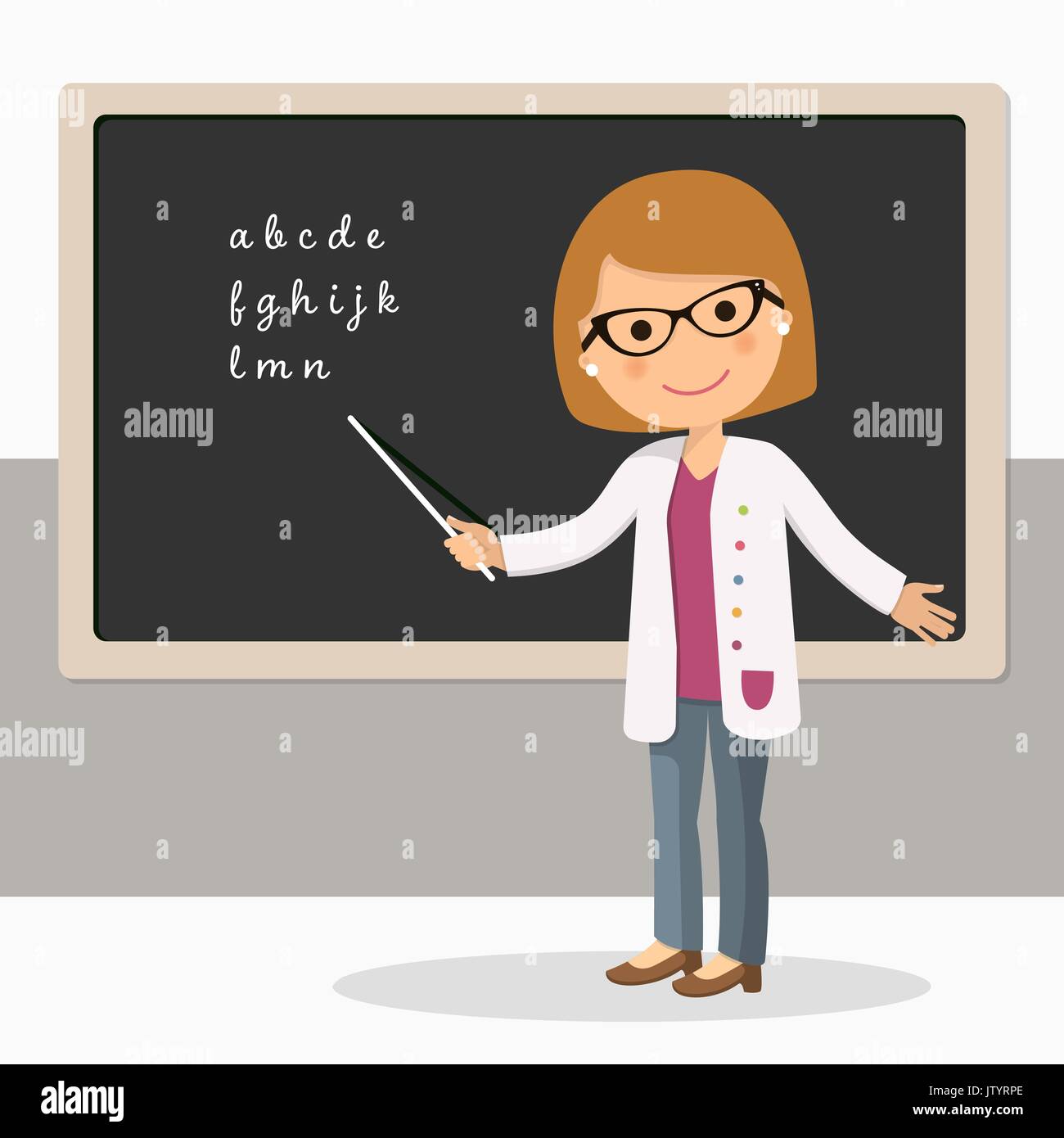 Young female teacher on alphabet lesson at blackboard in classroom ... Young female teacher on alphabet lesson at blackboard in classroom ...