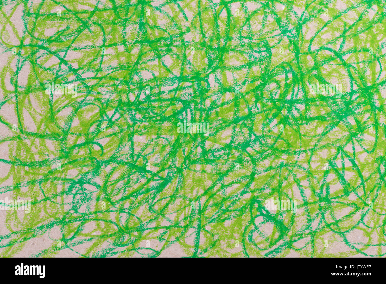 green crayon doodles drawing on brown paper background Stock Photo - Alamy