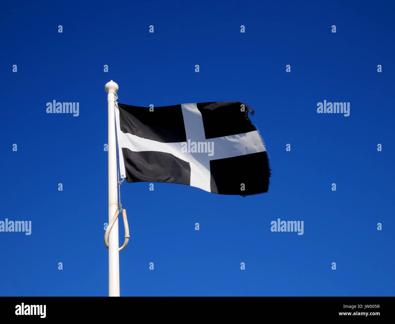 The Cornish cross of St Piran flying at Fistral, Newquay, Cornwall ...