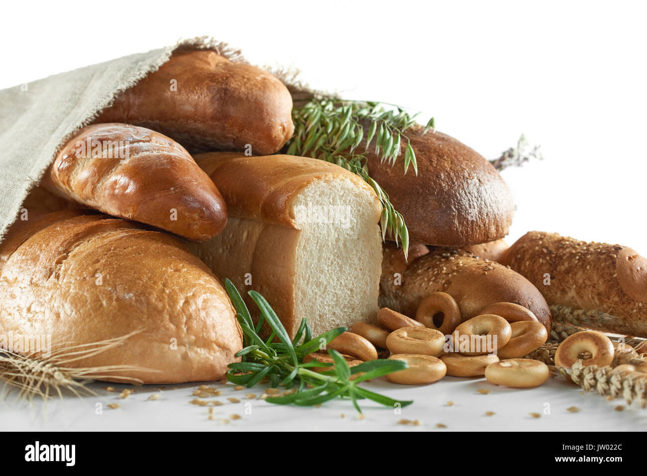 Assorted breads isolated on white Stock Photo - Alamy