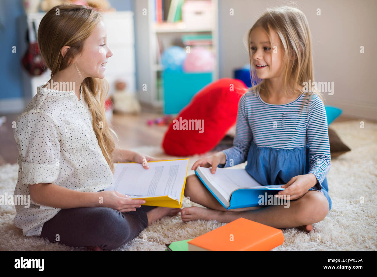 Reading can be a common passion Stock Photo - Alamy