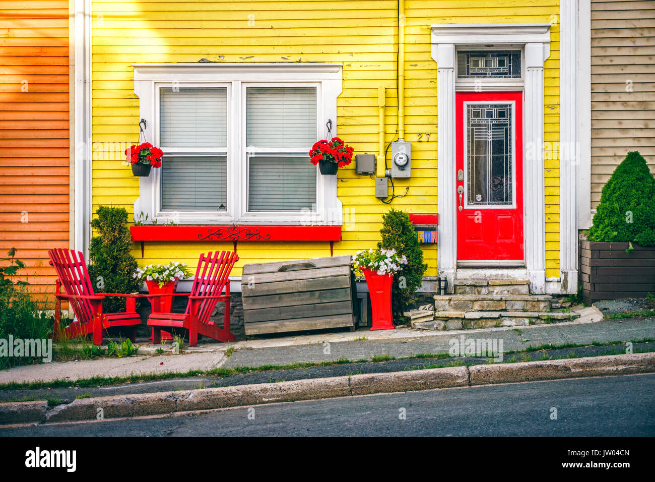 Wooden yellow traditional house in St John's downtown, Newfoundland ...