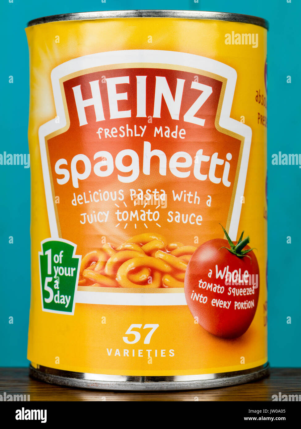 Tin or Can of Heinz Spaghetti Pasta in Tomato Sauce Against a Blue ...