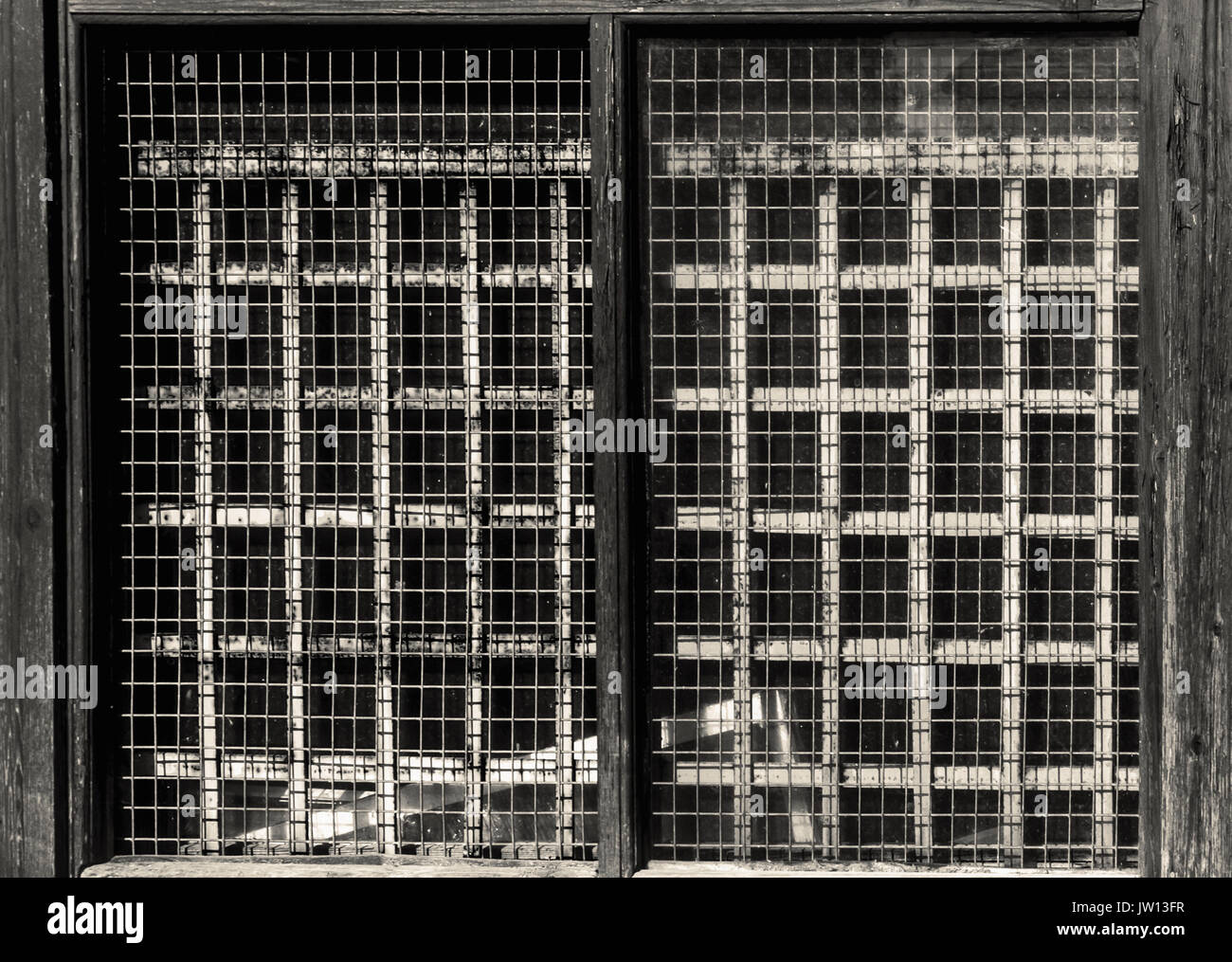 Old window with bars like symbol of past and retro in sepia Stock Photo ...