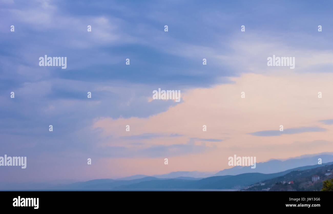Sunset sky over mountains hi-res stock photography and images - Alamy