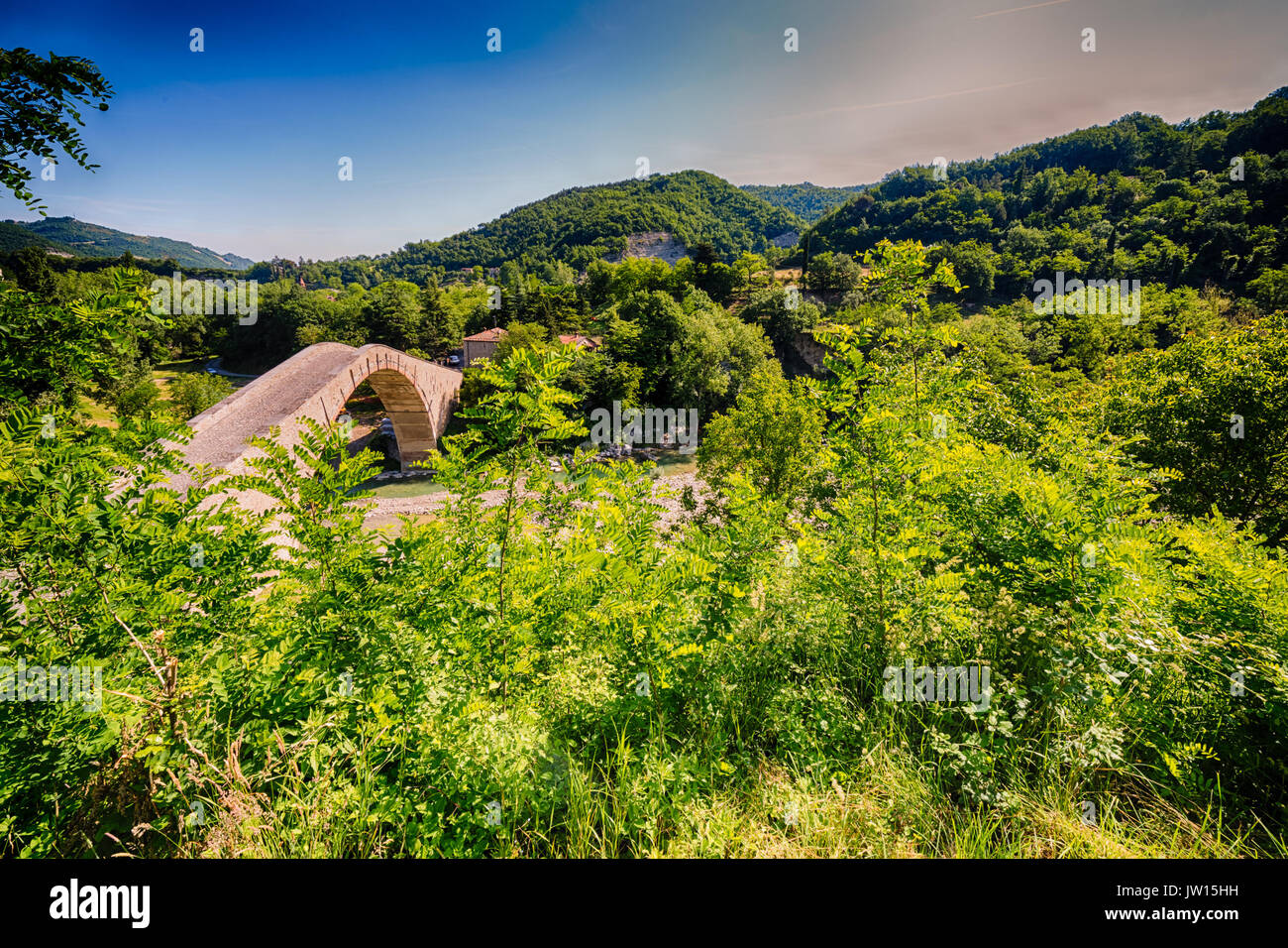 single span bridge in green countryside in Italy Stock Photo - Alamy