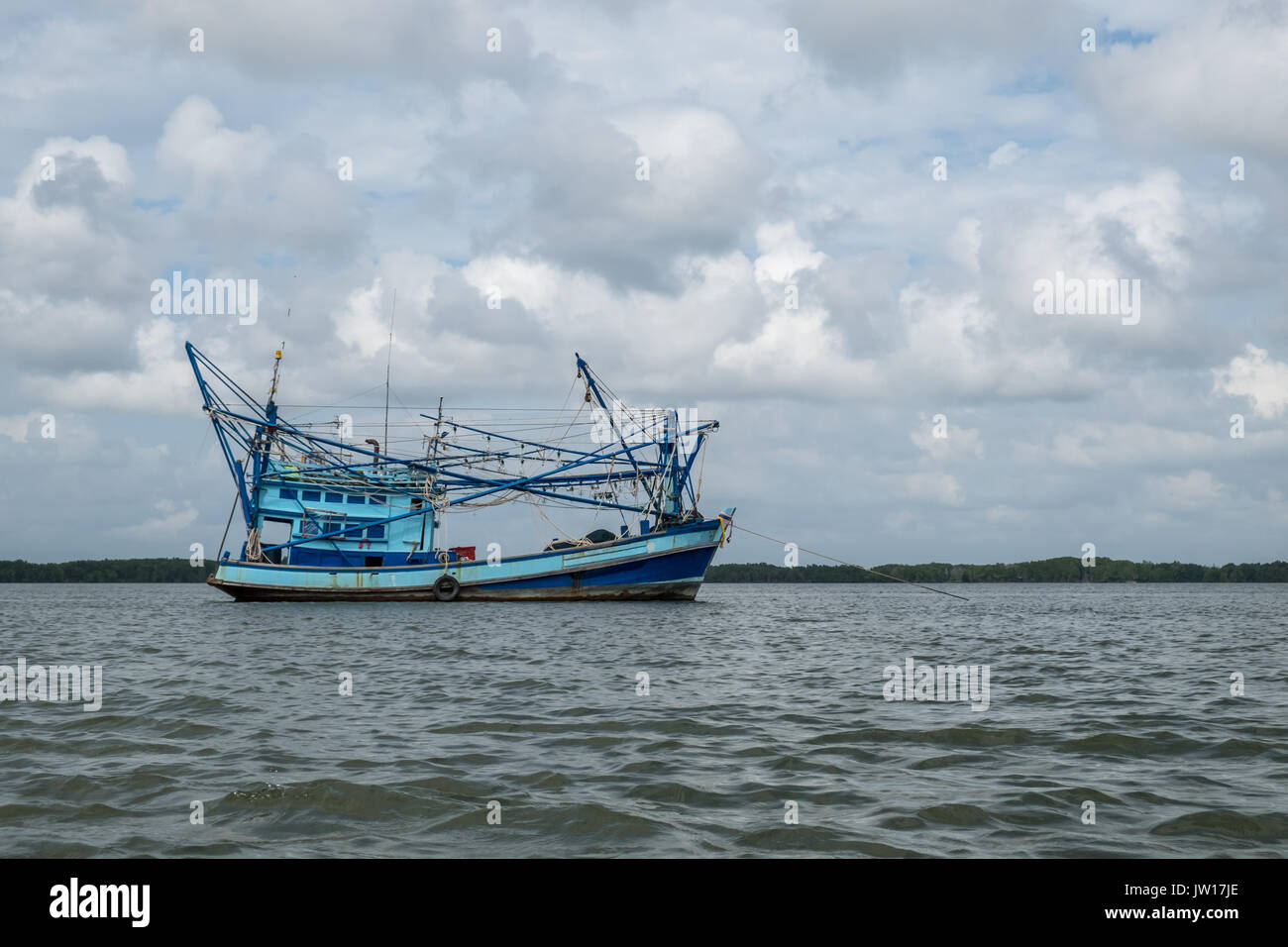 Fishing boat in the sea Stock Photo - Alamy