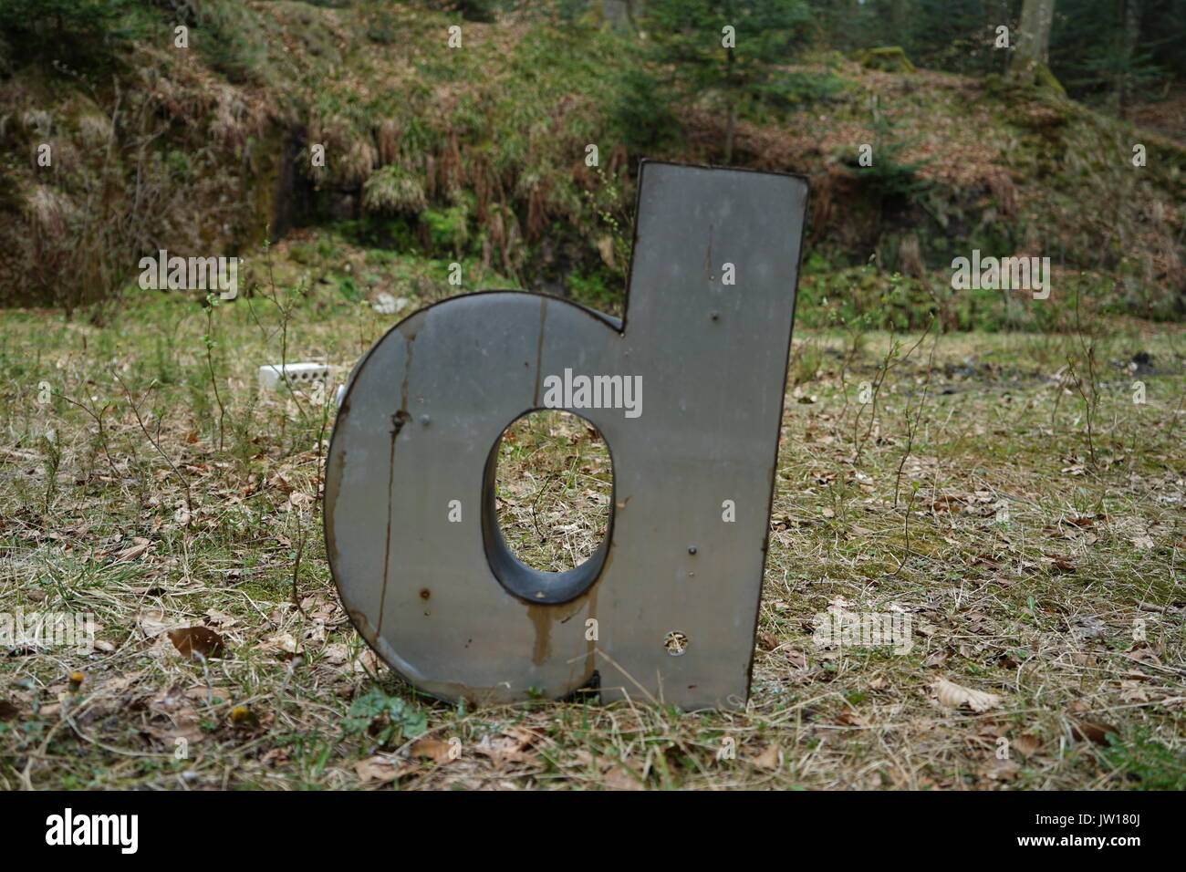 An old fell down letter in the nature Stock Photo - Alamy