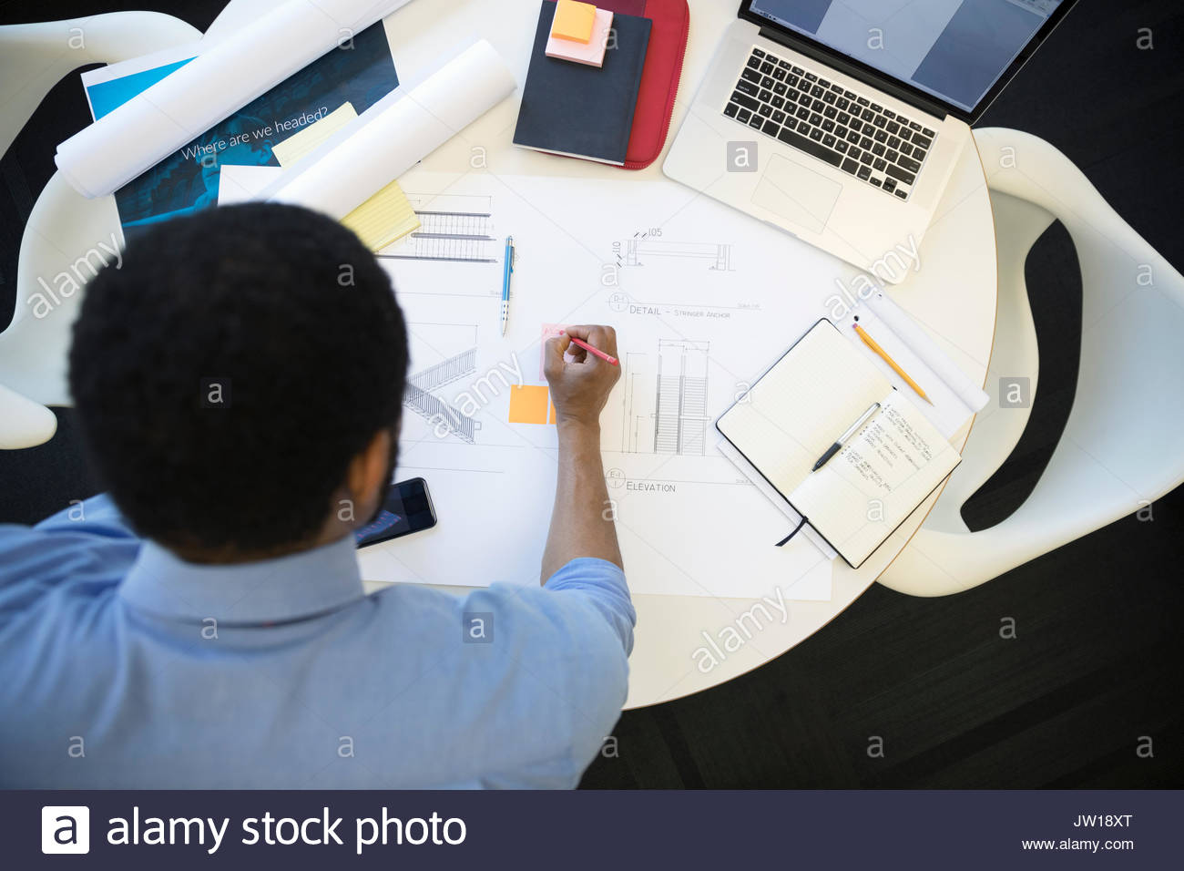 Overhead view architect drafting blueprints hi-res stock photography ...