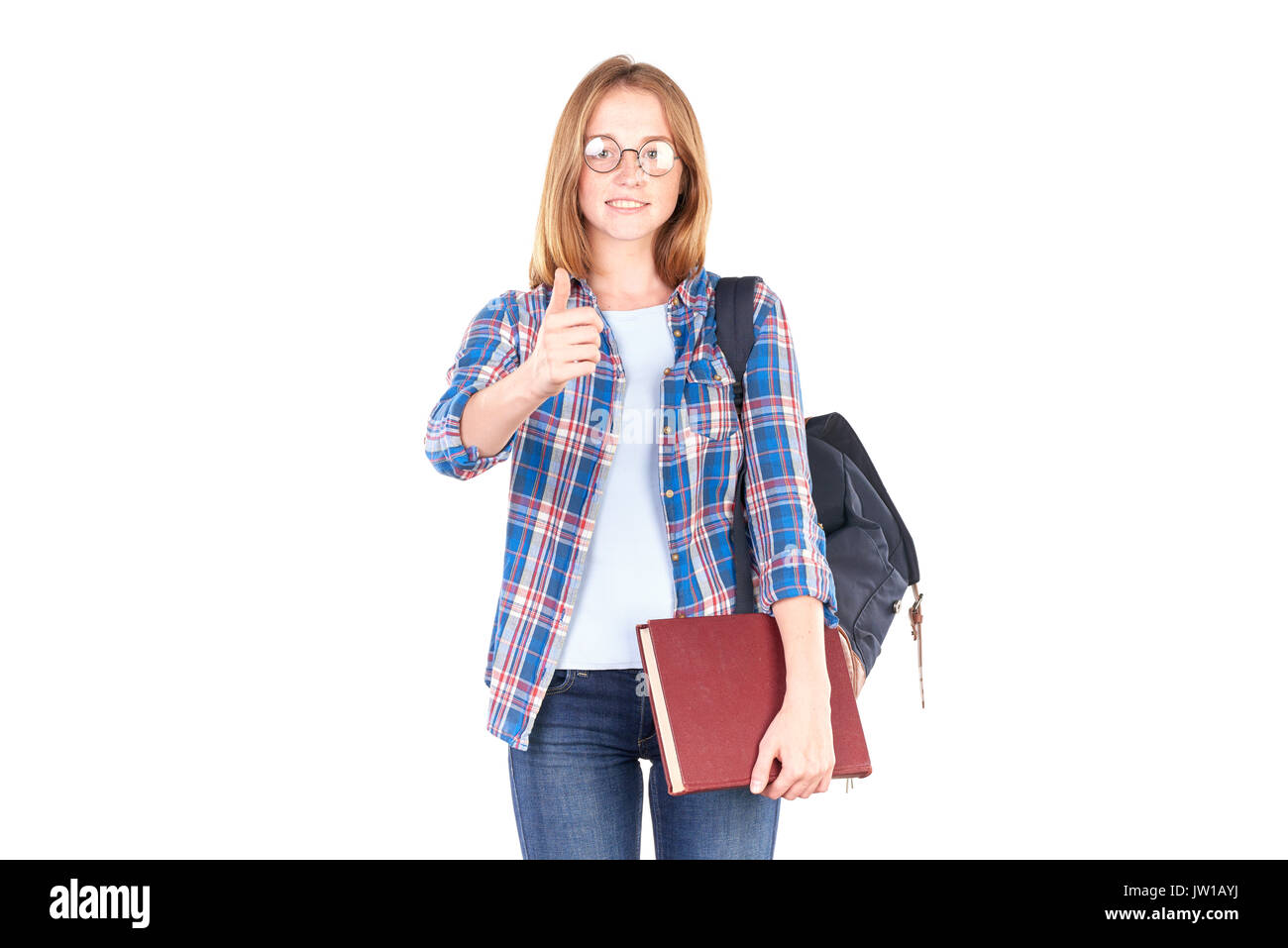 Student posing with textbook Stock Photo - Alamy