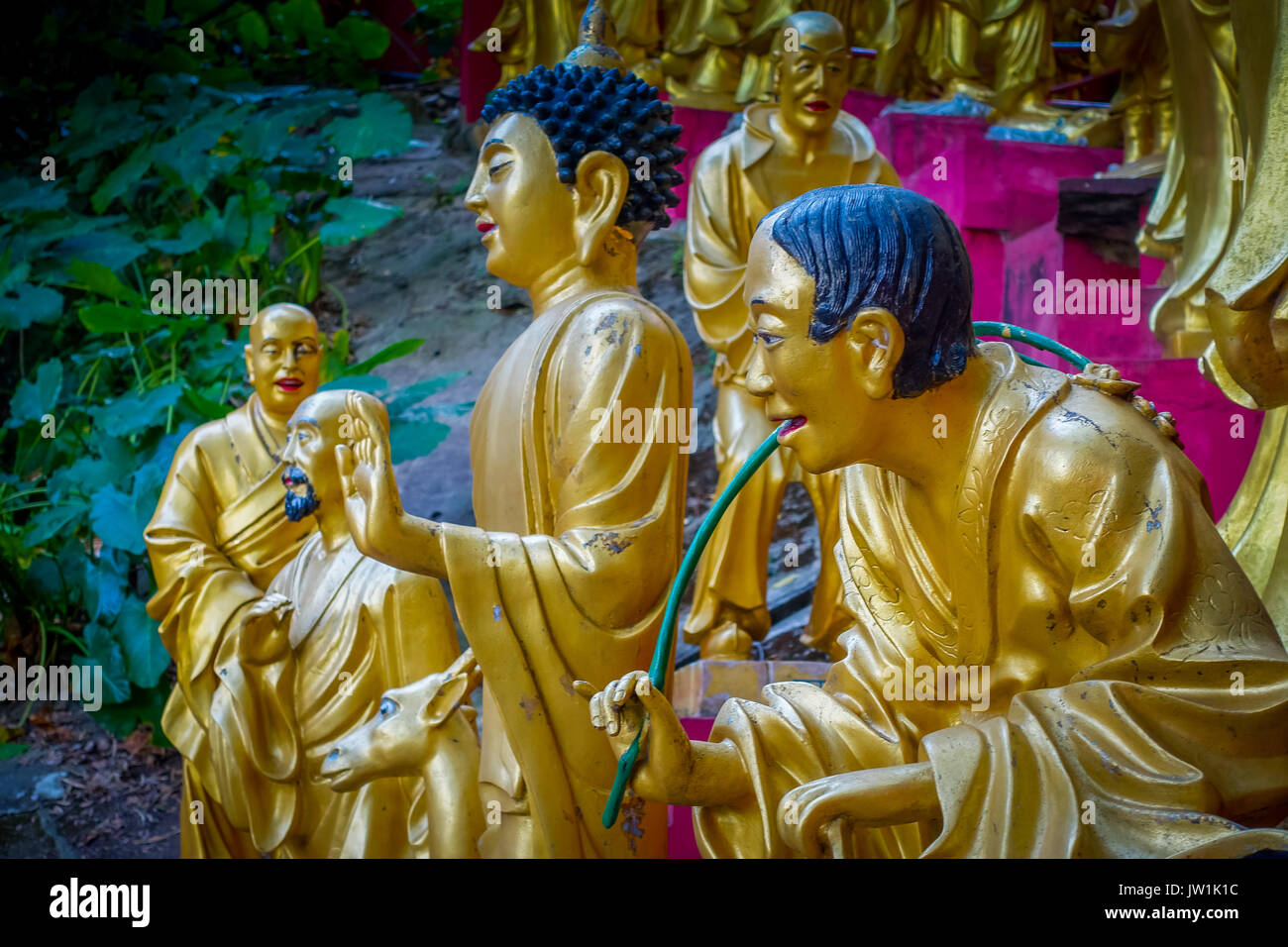 Spectacular golden statues at Ten Thousand Buddhas Monastery in Sha Tin ...