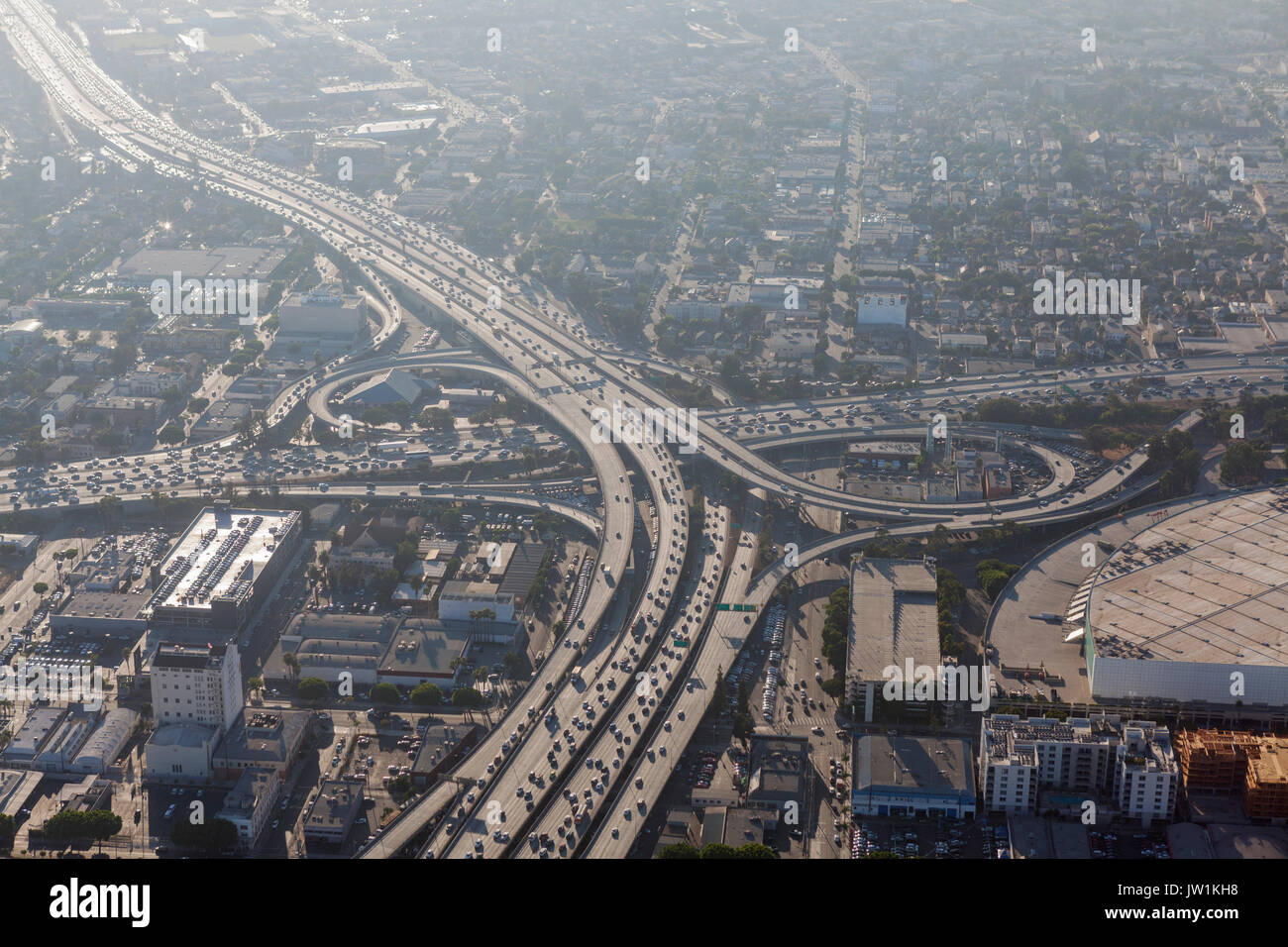 Smoggy afternoon aerial view of Harbor 110 and Santa Monica 10 freeways ...