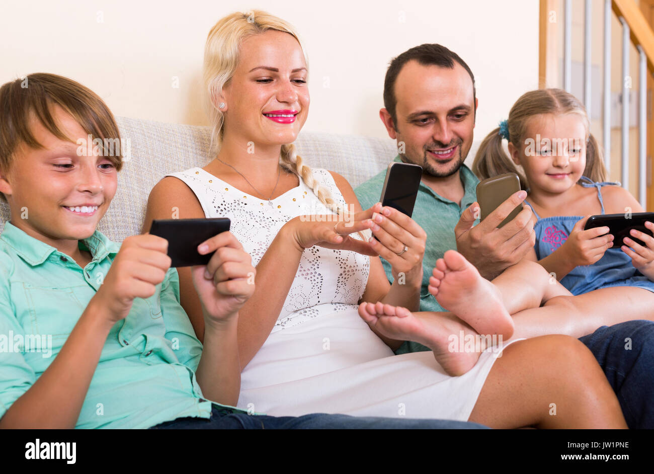 Children playing gadgets hi-res stock photography and images - Alamy