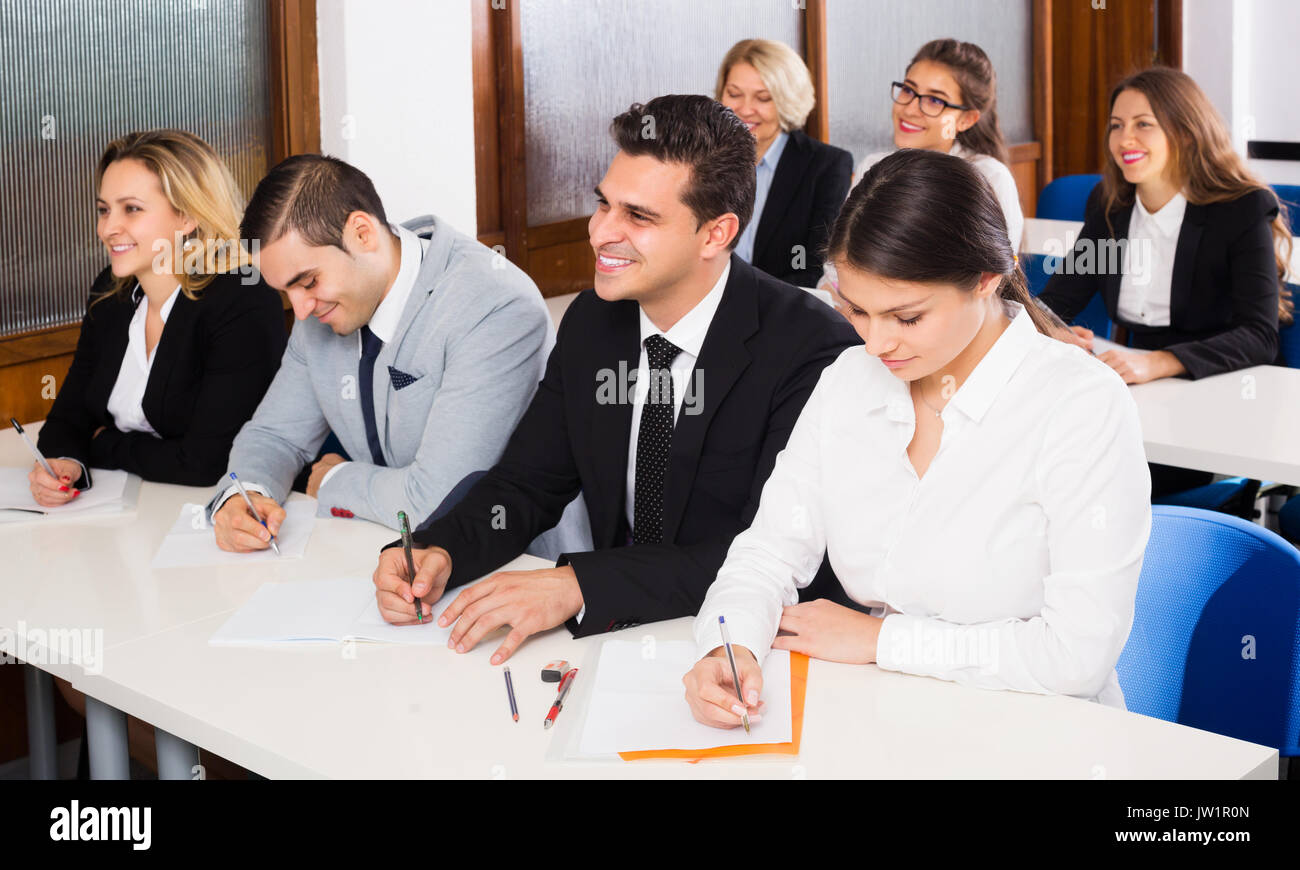 Professor and positive students at extension business courses Stock ...