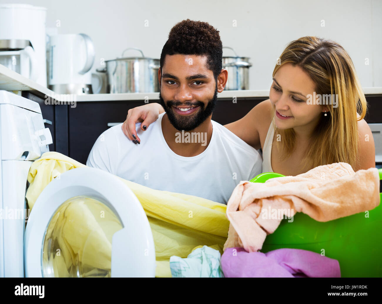 Man unloading washing machine hi-res stock photography and images - Alamy