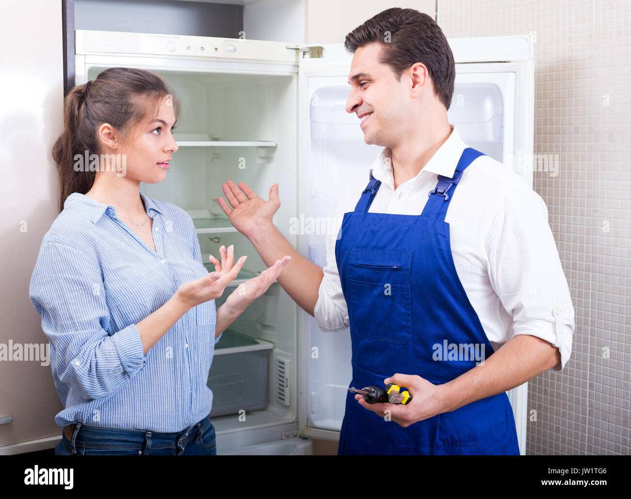 Woman refrigerator worried hi-res stock photography and images - Alamy