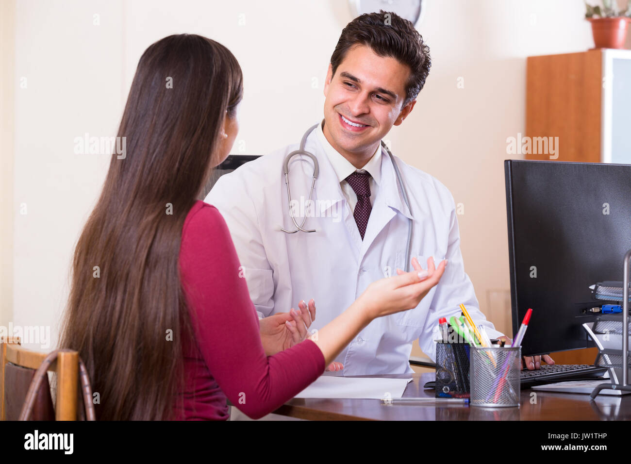 Patient questioning doctor hi-res stock photography and images - Alamy