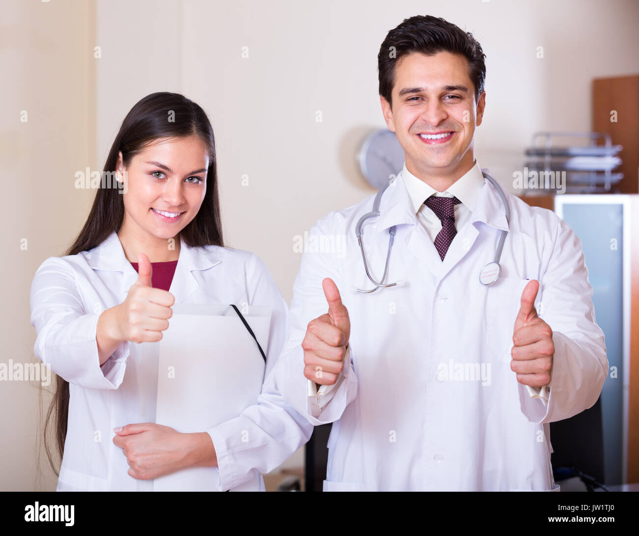 Portrait of two professional european doctors smiling in clinic Stock ...