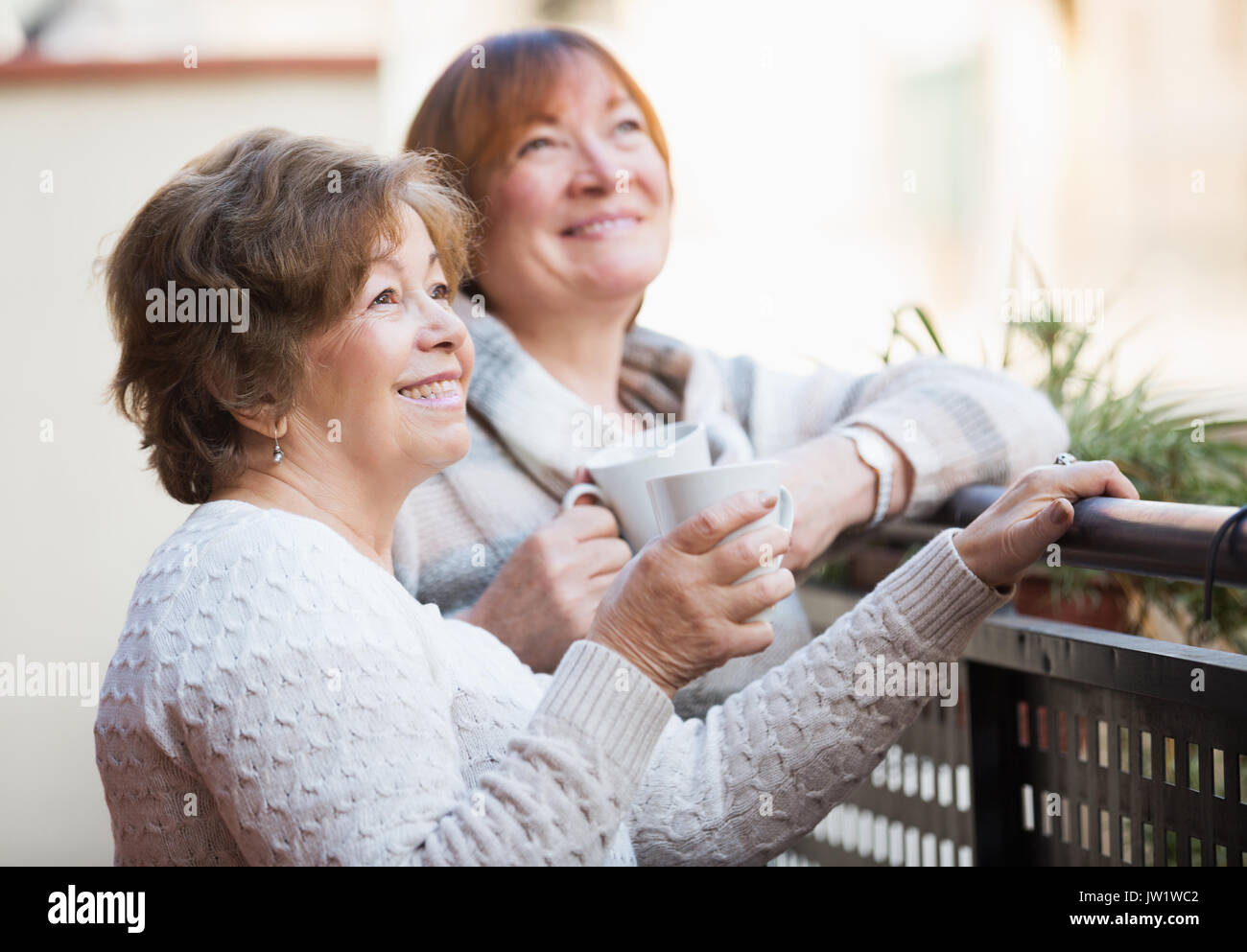 Two mature women having tea hi-res stock photography and images - Alamy