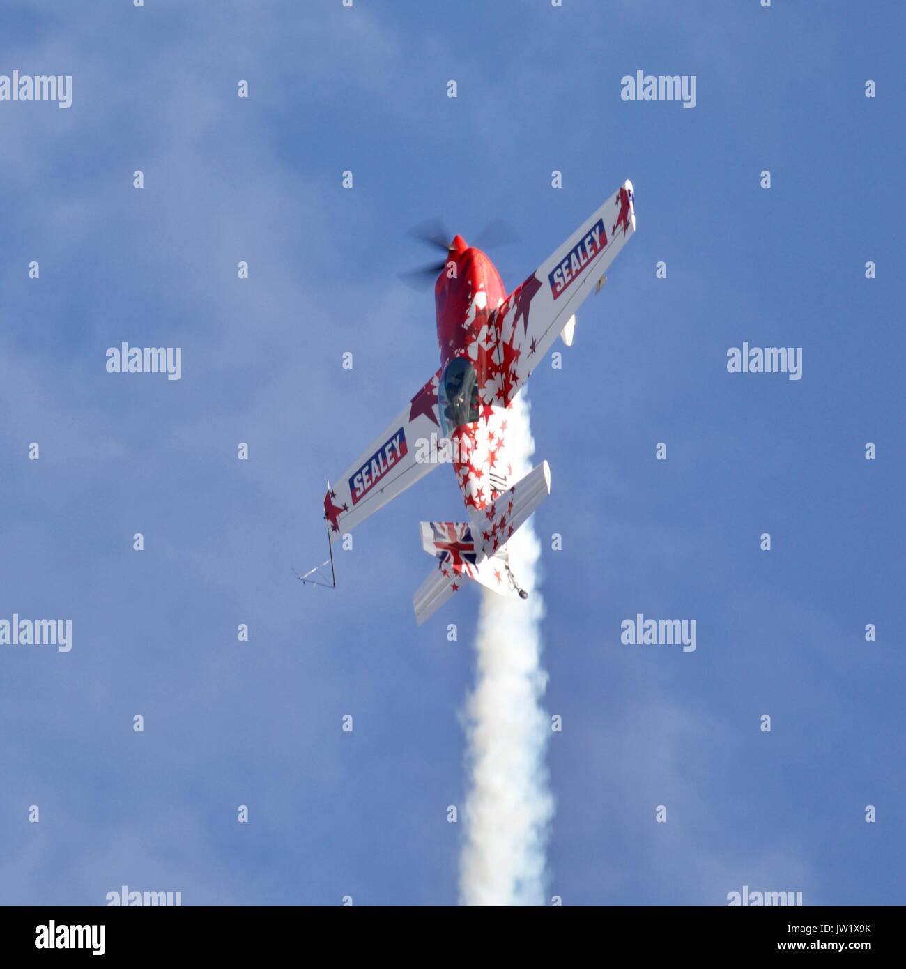 Chris Burkett from the Global Stars Aerobatic Team performing a fast ...