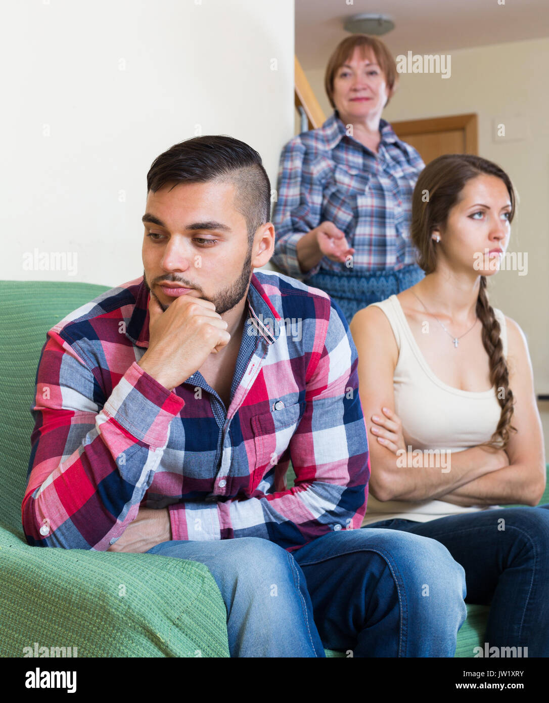 Adult childrens has a stressful conversation with their mother Stock ...