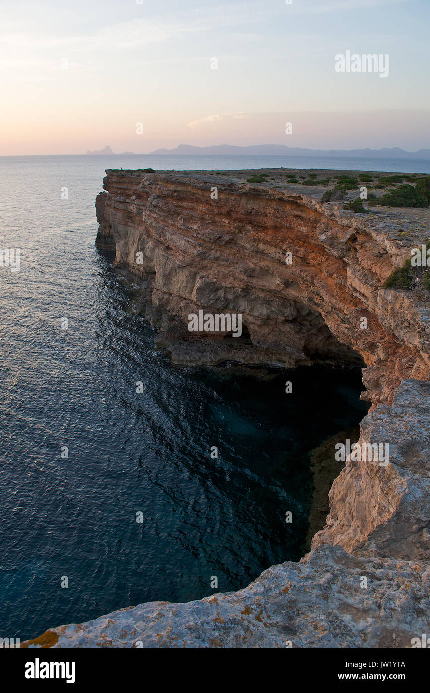 View of Es Vedrá and Ibiza coastline from Punta Rasa cliffs at ...