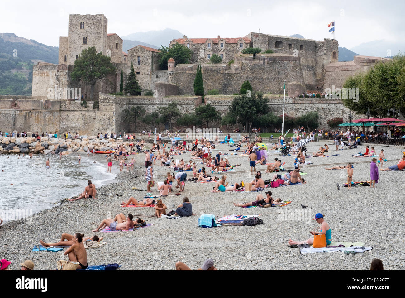 The Chateau Royal at Collioure, Spain, and its pretty harbour and beach ...