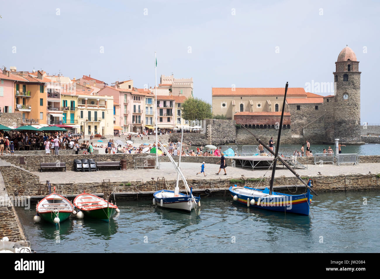 The seafront at Collioure, Spain, with its pretty harbour and beach ...