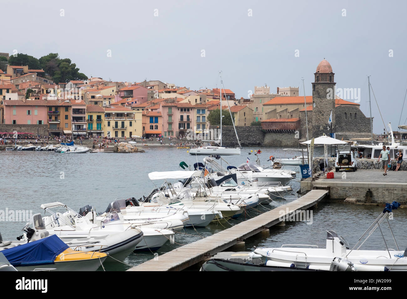 The seafront at Collioure, Spain, with its pretty harbour and beach ...