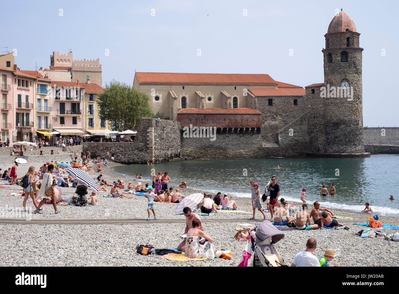 The seafront at Collioure, Spain, with its pretty harbour and beach ...