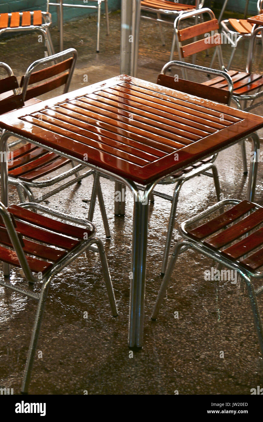 Wet chairs and table hi-res stock photography and images - Alamy