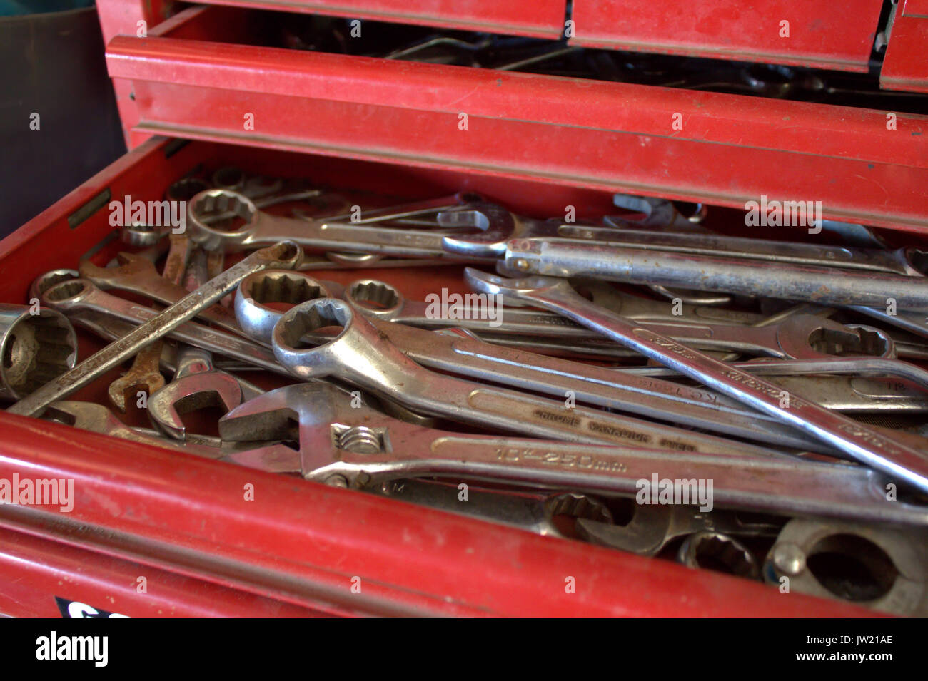 Spanners,Shifters & other tools in an open drawer of a red toolbox in a ...