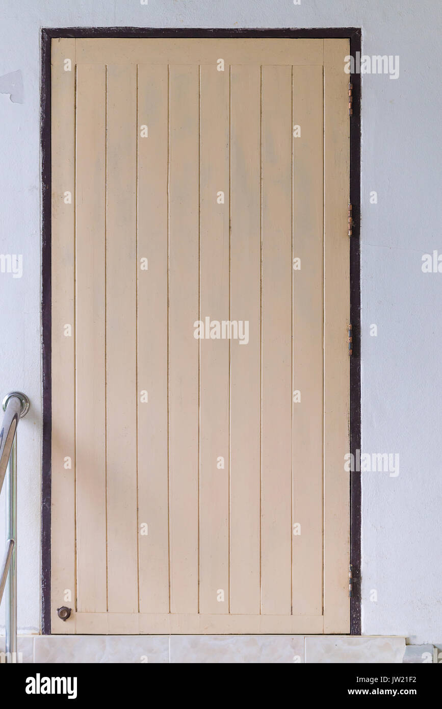 White wall and wooden door, background texture Stock Photo - Alamy