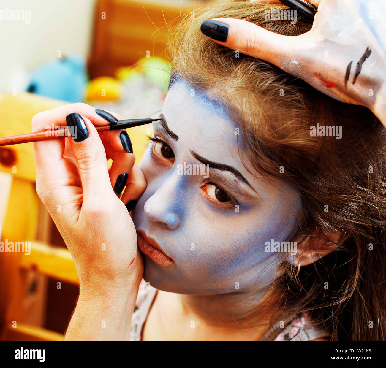 little cute child making facepaint on birthday party, zombie Apo Stock ...